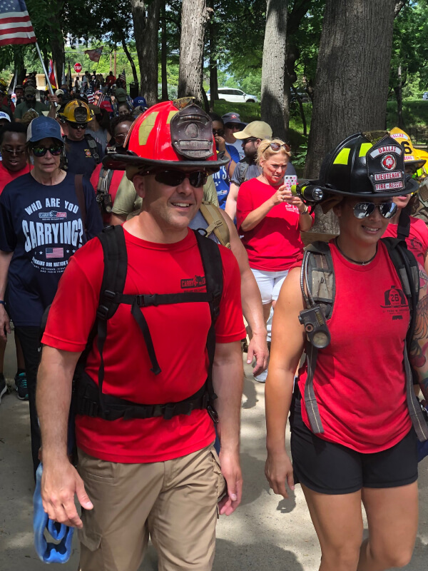 Volunteer To Walk to help Carry The Load